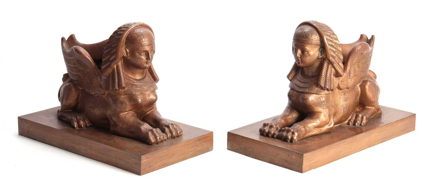 Lot 436 - A PAIR OF BRONZED SPHINX ON PLINTH BASES, 39.