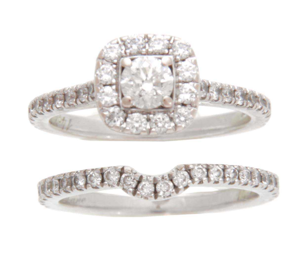 Lot 663 - A 14K WHITE GOLD SQUARE DIAMOND CLUSTRE RING