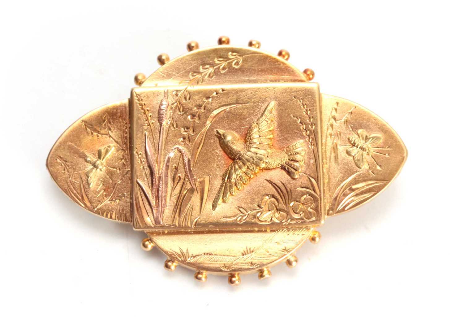 Lot 753 - A YELLOW GOLD BROOCH with panelled centre