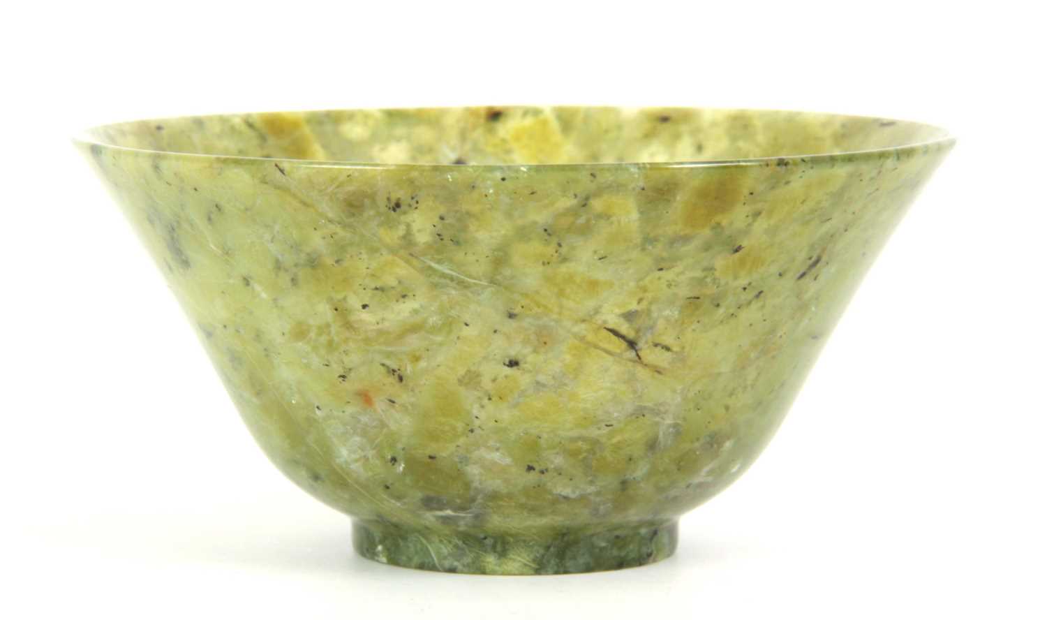 Lot 212 - A CHINESE TRANSLUCENT NEPHRITE FOOTED BOWL