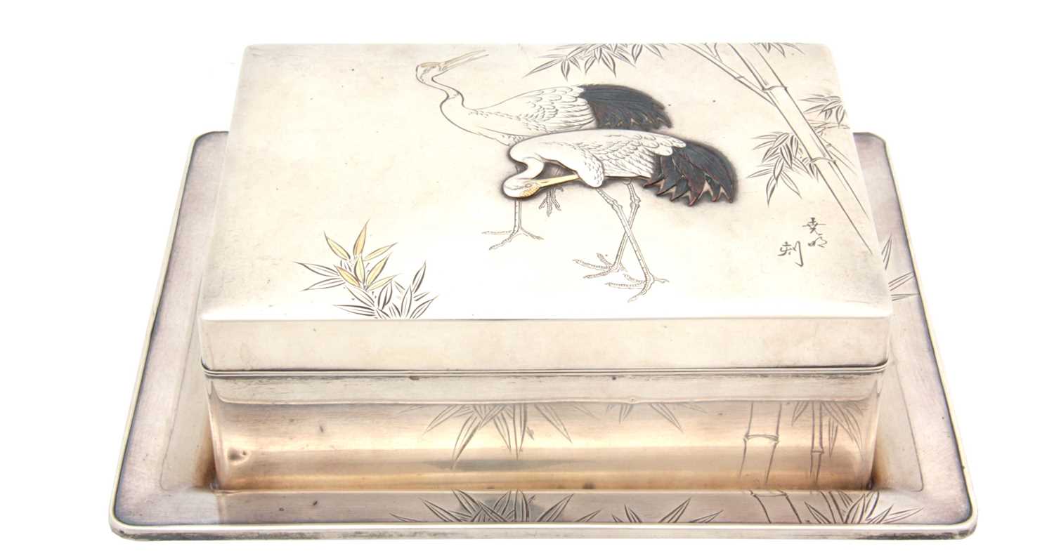 Lot 222 - A JAPANESE MEIJI PERIOD SILVER BOX ON STAND
