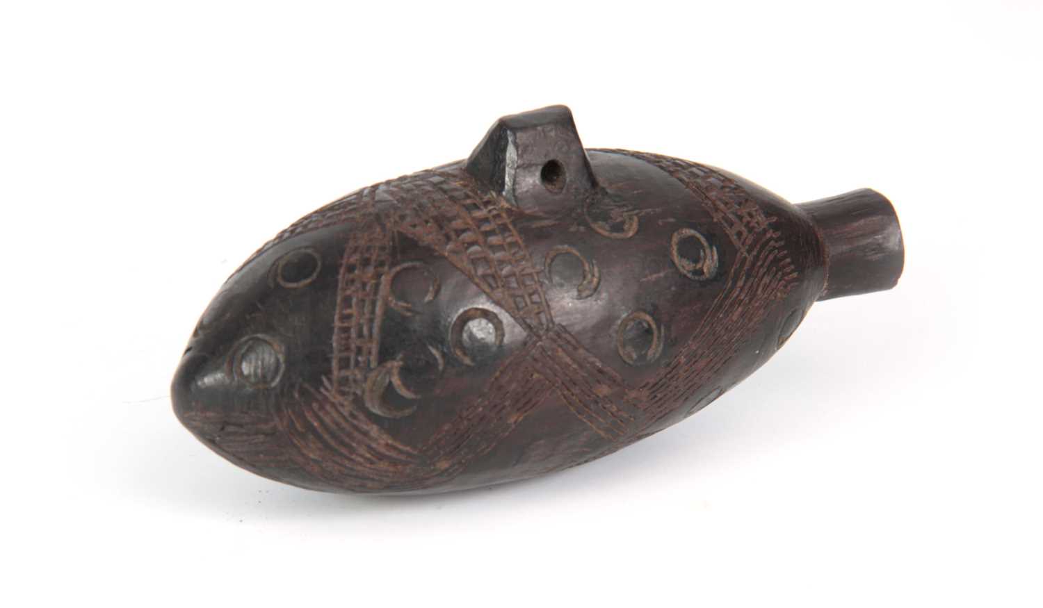 Lot 500 - A CARVED AFRICAN HARDWOOD SNUFF BOTTLE with