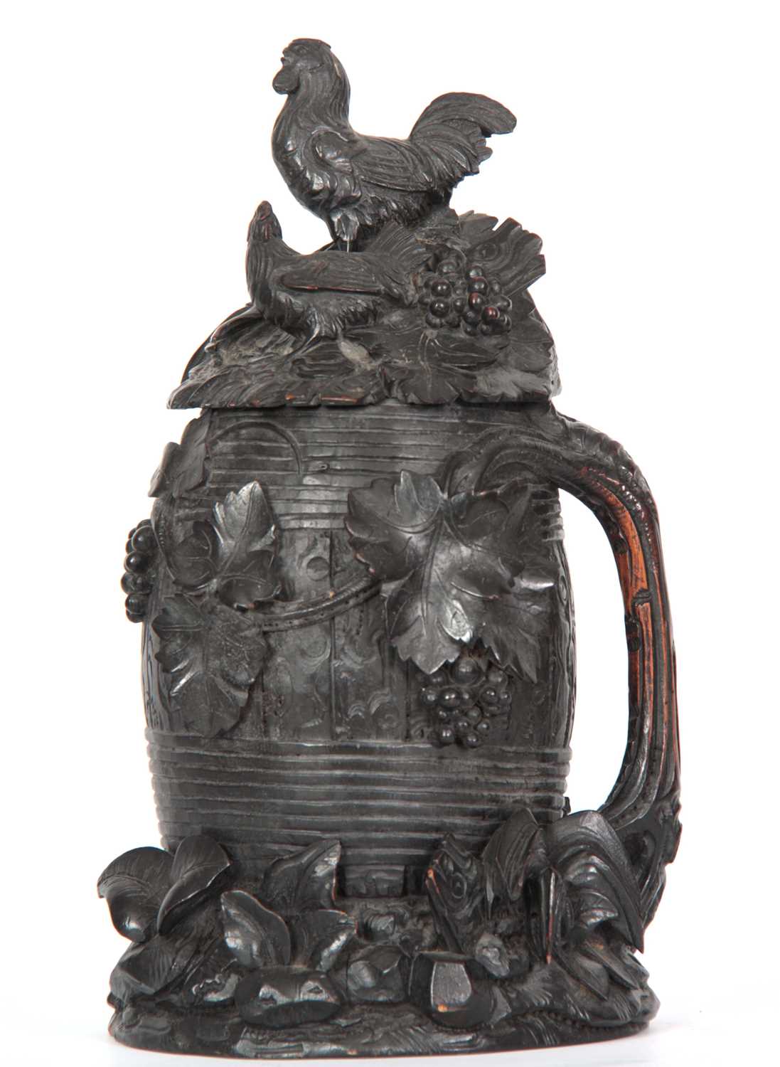 Lot 617 - A LARGE 19TH CENTURY SWISS CARVED WOOD STEIN