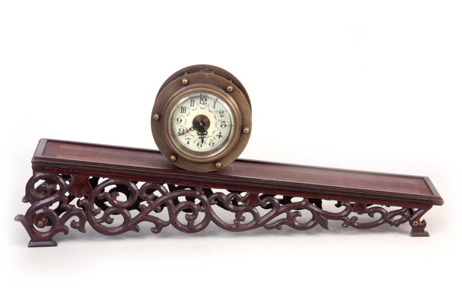 Lot 371 - A BRASS CASED INCLINE GRAVITY CLOCK with