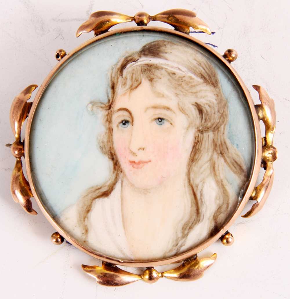 Lot 557 - A VICTORIAN CIRCULAR MINIATURE BUST PORTRAIT