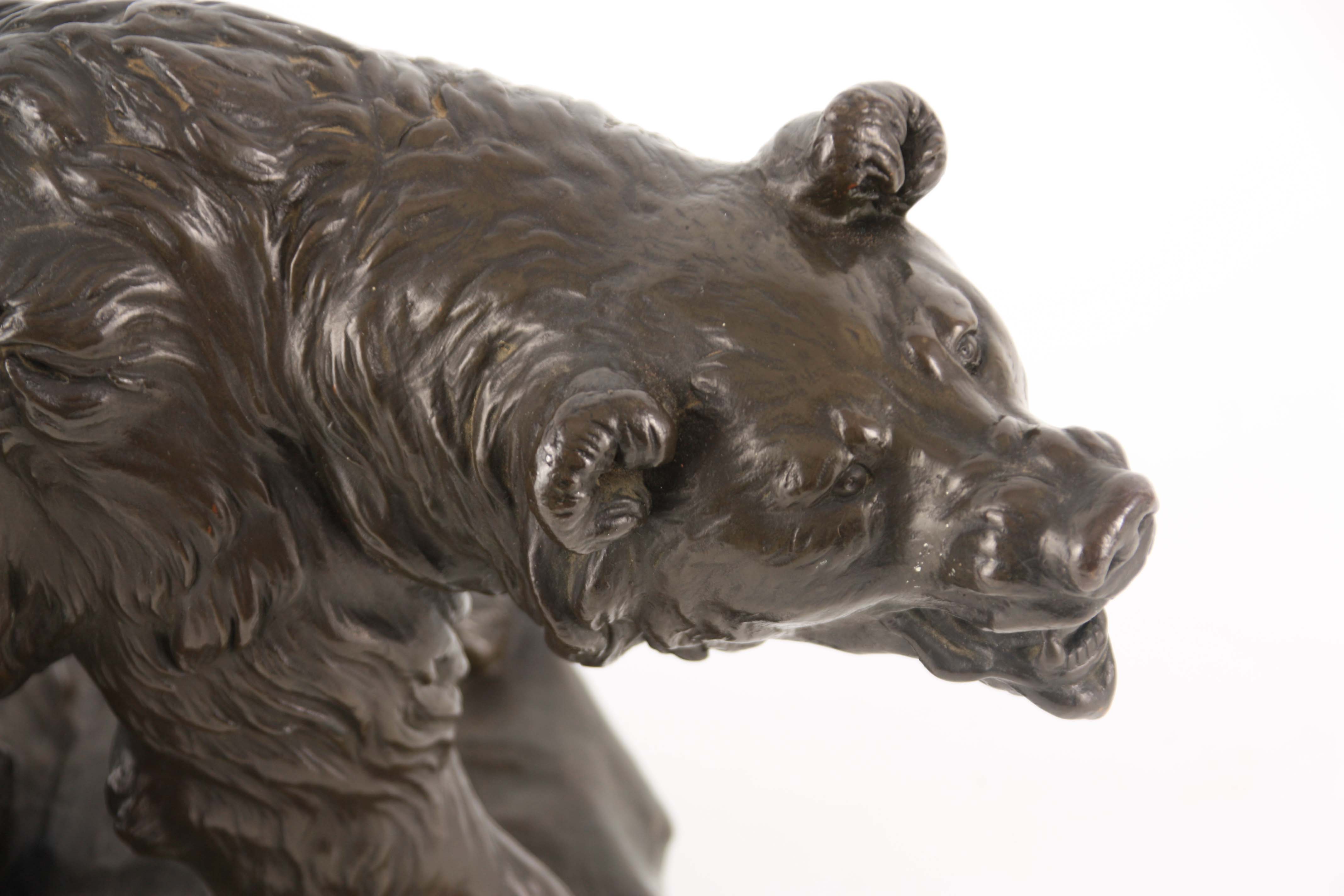 Lot 555 - A BRONZE SCULPTURE OF A WOUNDED BEAR mounted