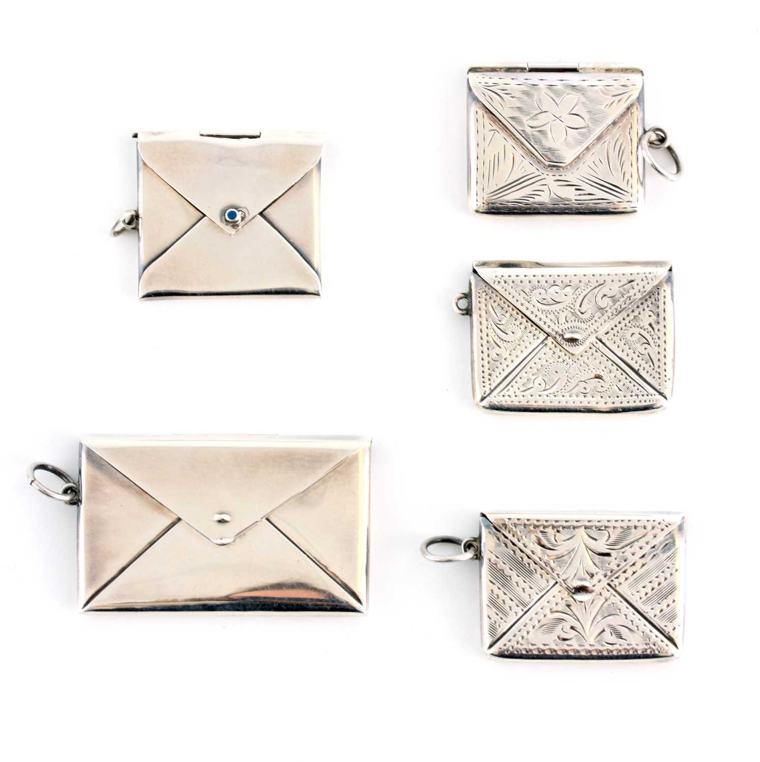 Lot 315 - A COLLECTION OF FIVE SILVER ENVELOPE STAMP