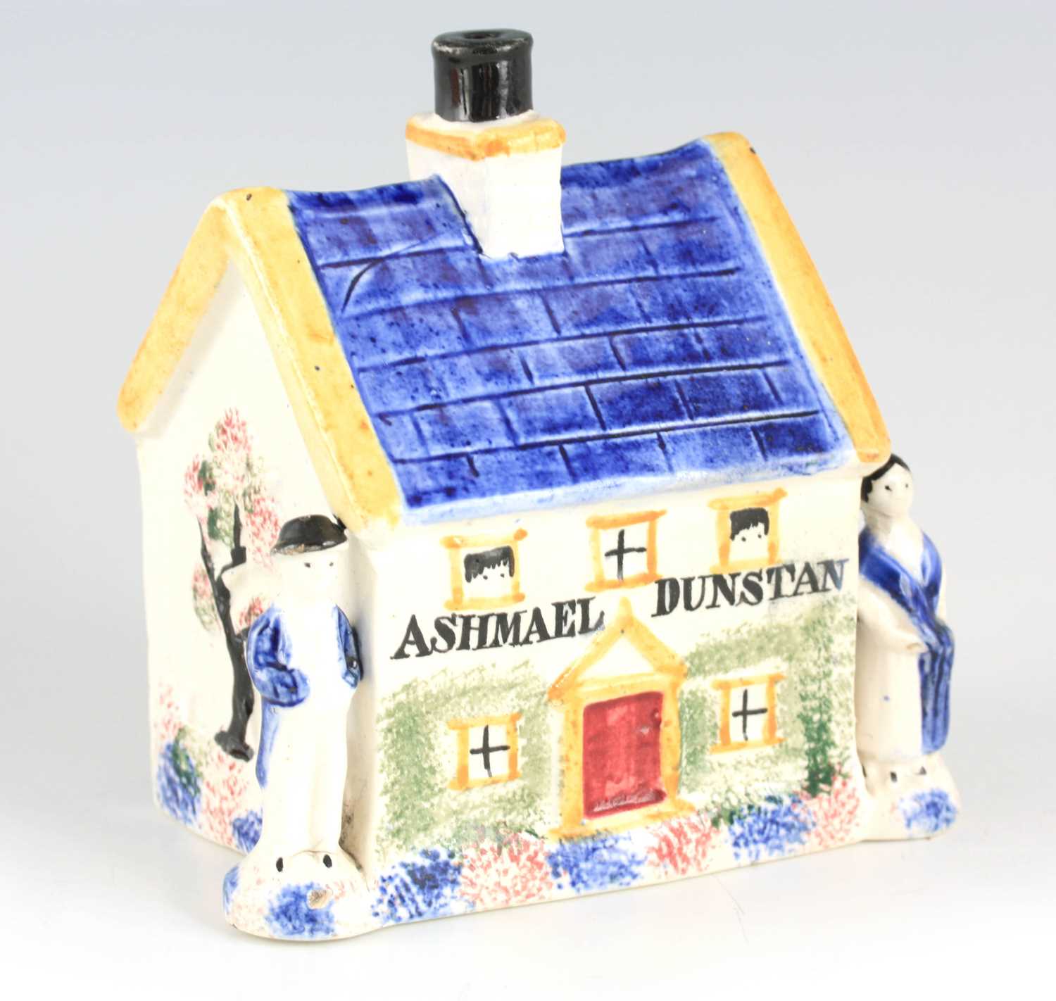 Lot 42 - A 19TH CENTURY PRATTWARE POTTERY MONEY BOX