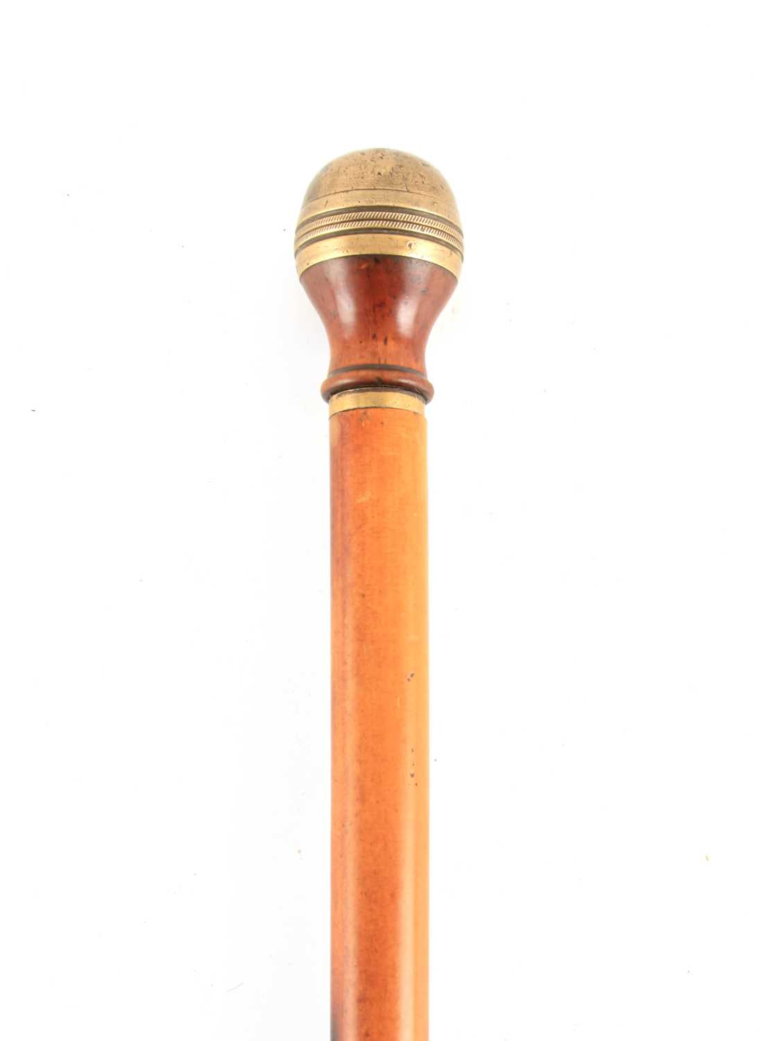 Lot 448 - A 19TH CENTURY MALACCA CANE WALKING STICK