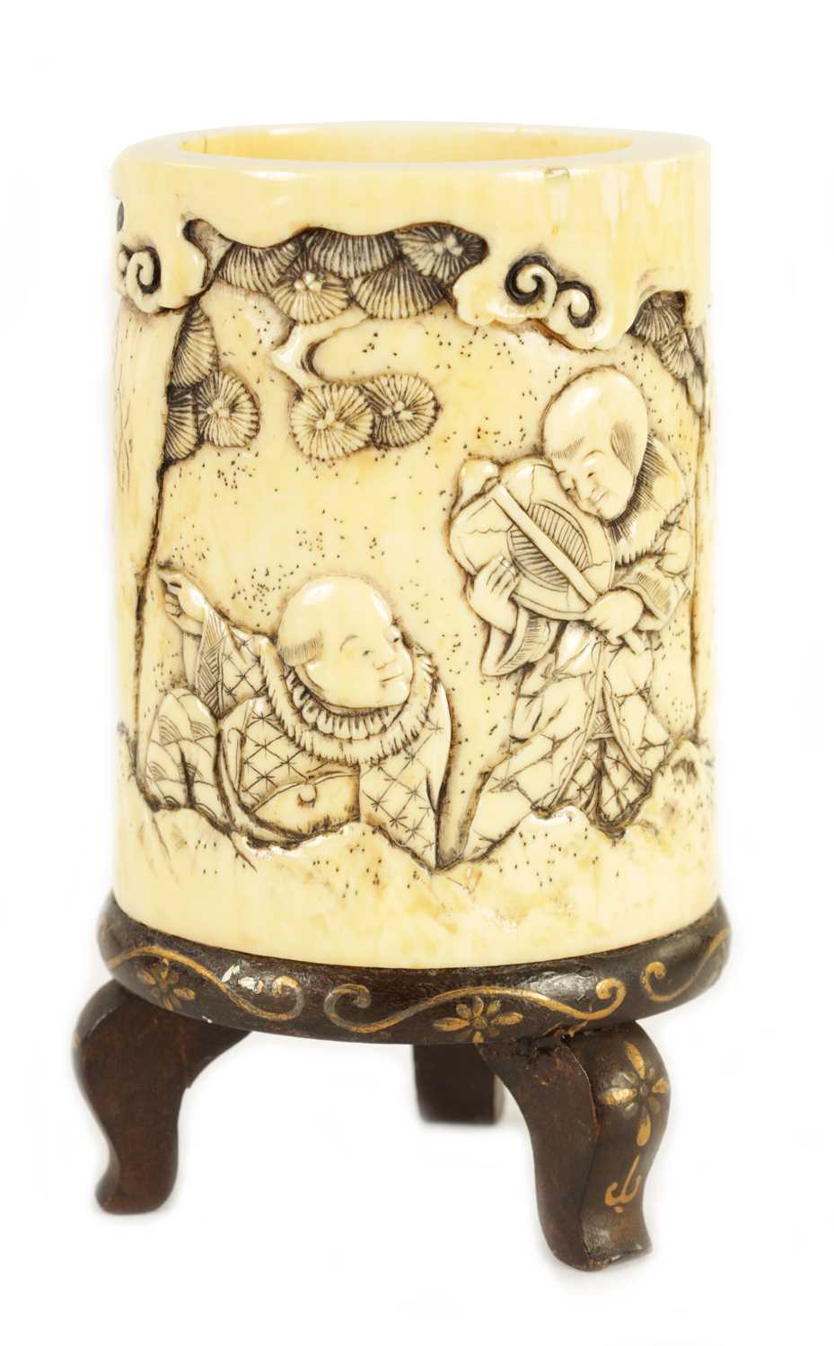 Lot 215 - A LATE 19TH CENTURY CARVED IVORY BRUSH POT