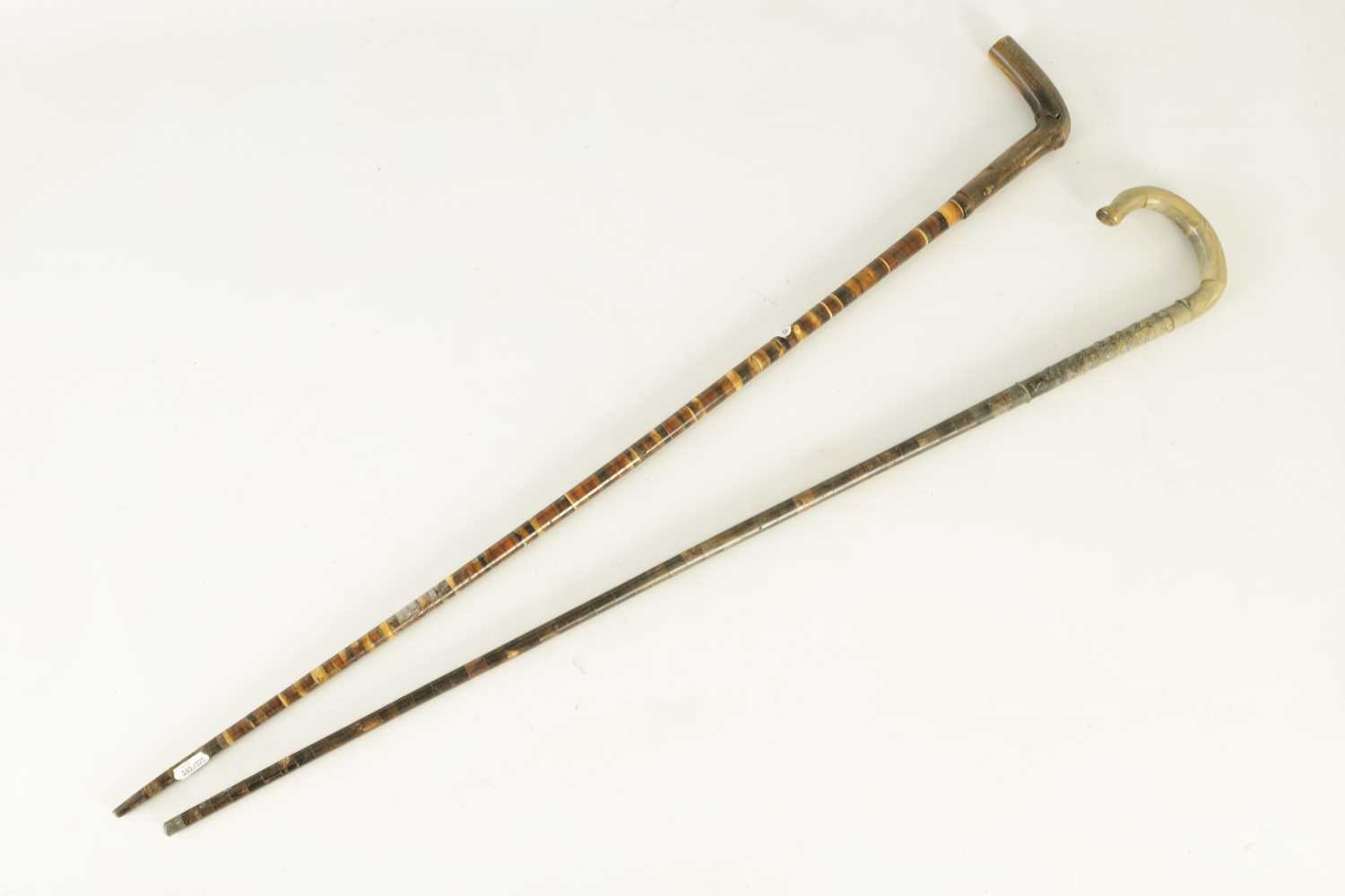 Lot 490 - TWO LATE 19TH CENTURY SEGMENTED HORN WALKING