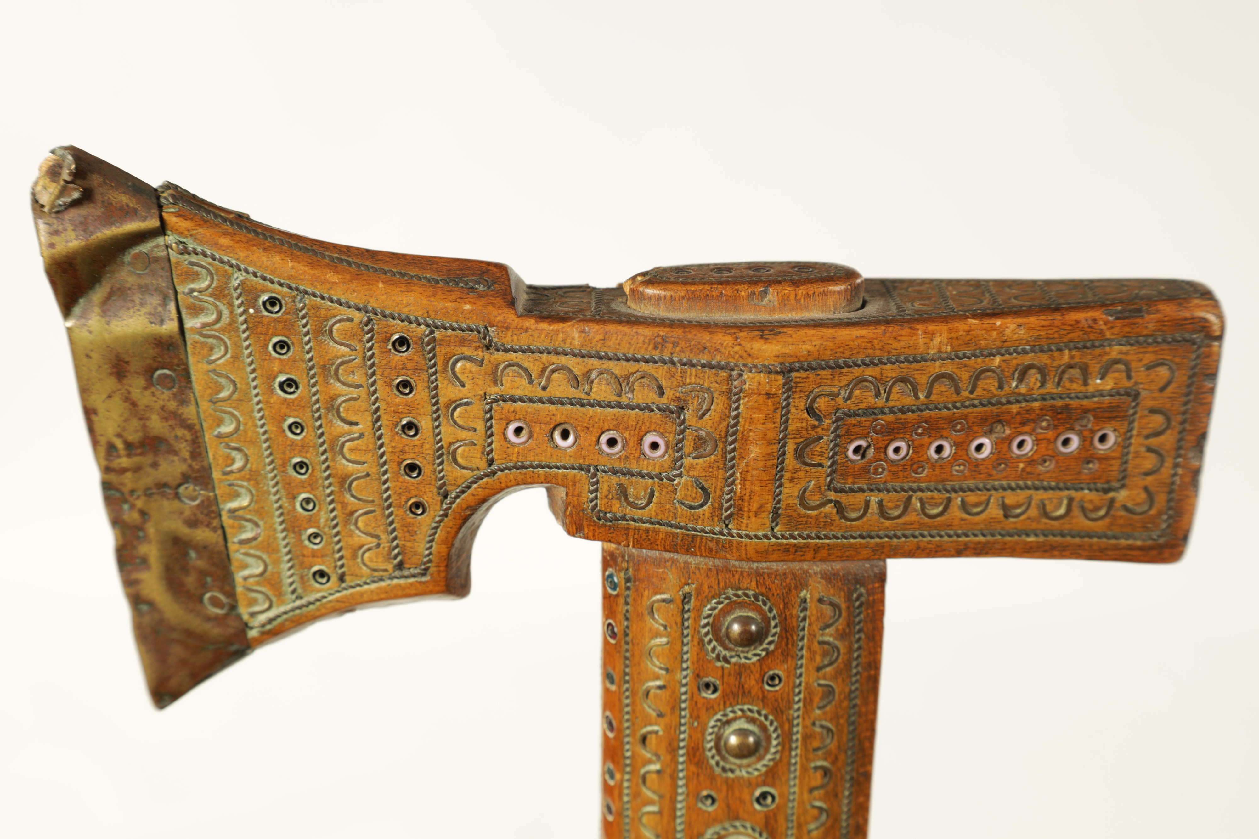 Lot 357 - A 19TH CENTURY EASTERN AXE HEAD HANDLED