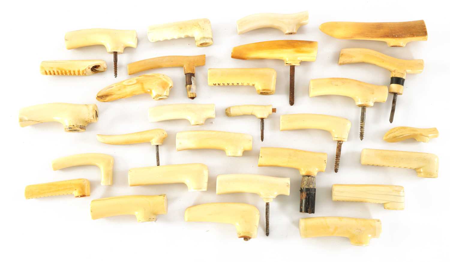 Lot 341 - A SELECTION OF 28 19TH CENTURY CARVED AND