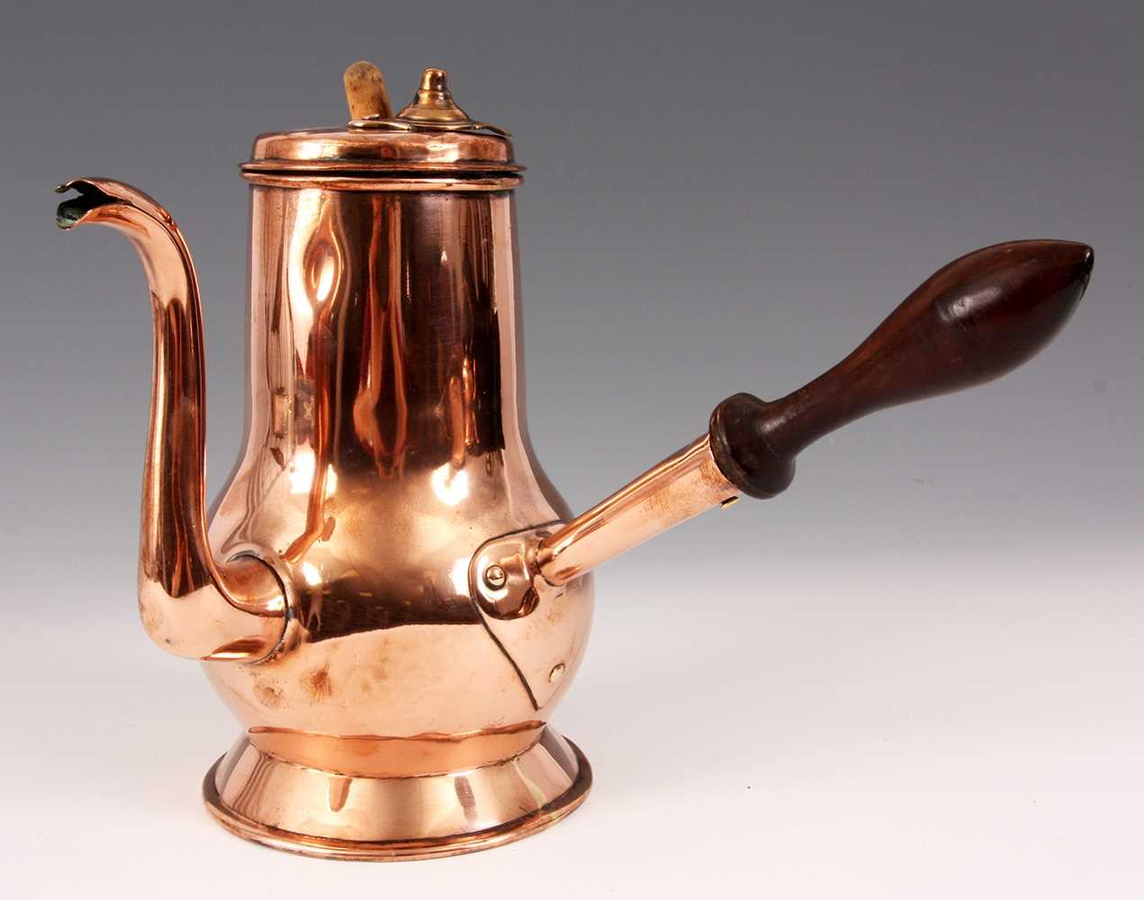 Lot 295 - A GEORGIAN COPPER CHOCOLATE POT AND COVER of