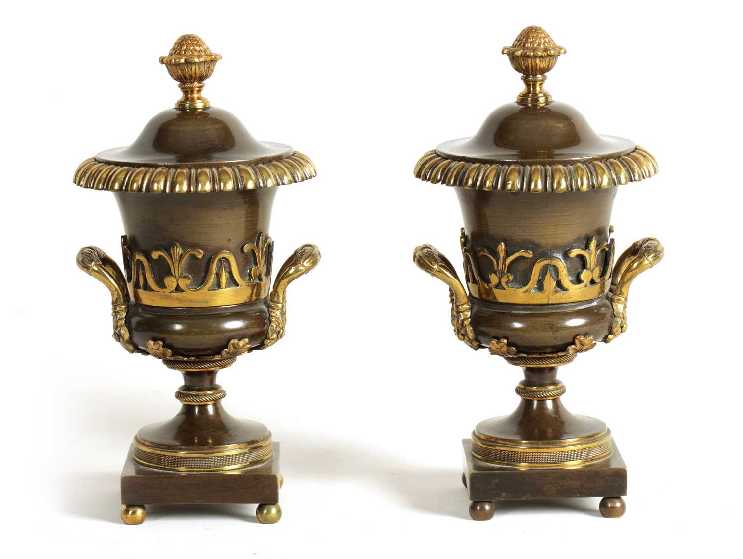 Lot 543 - A PAIR OF REGENCY BRONZE AND GILT BRONZE URN