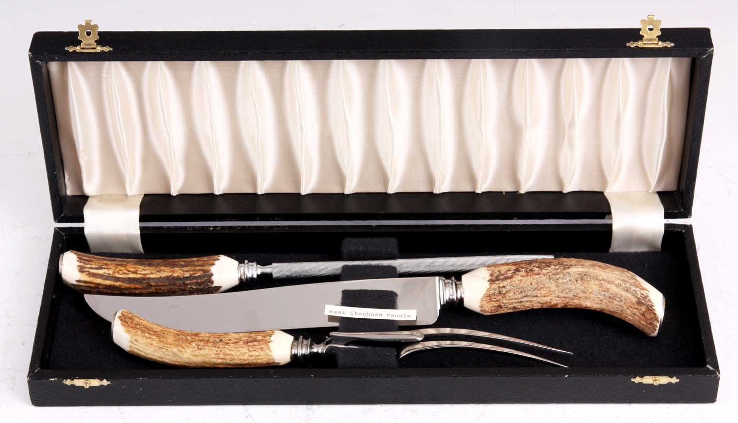 Lot 338 - A CASED SET OF STAG HORN HANDLED THREE PIECE