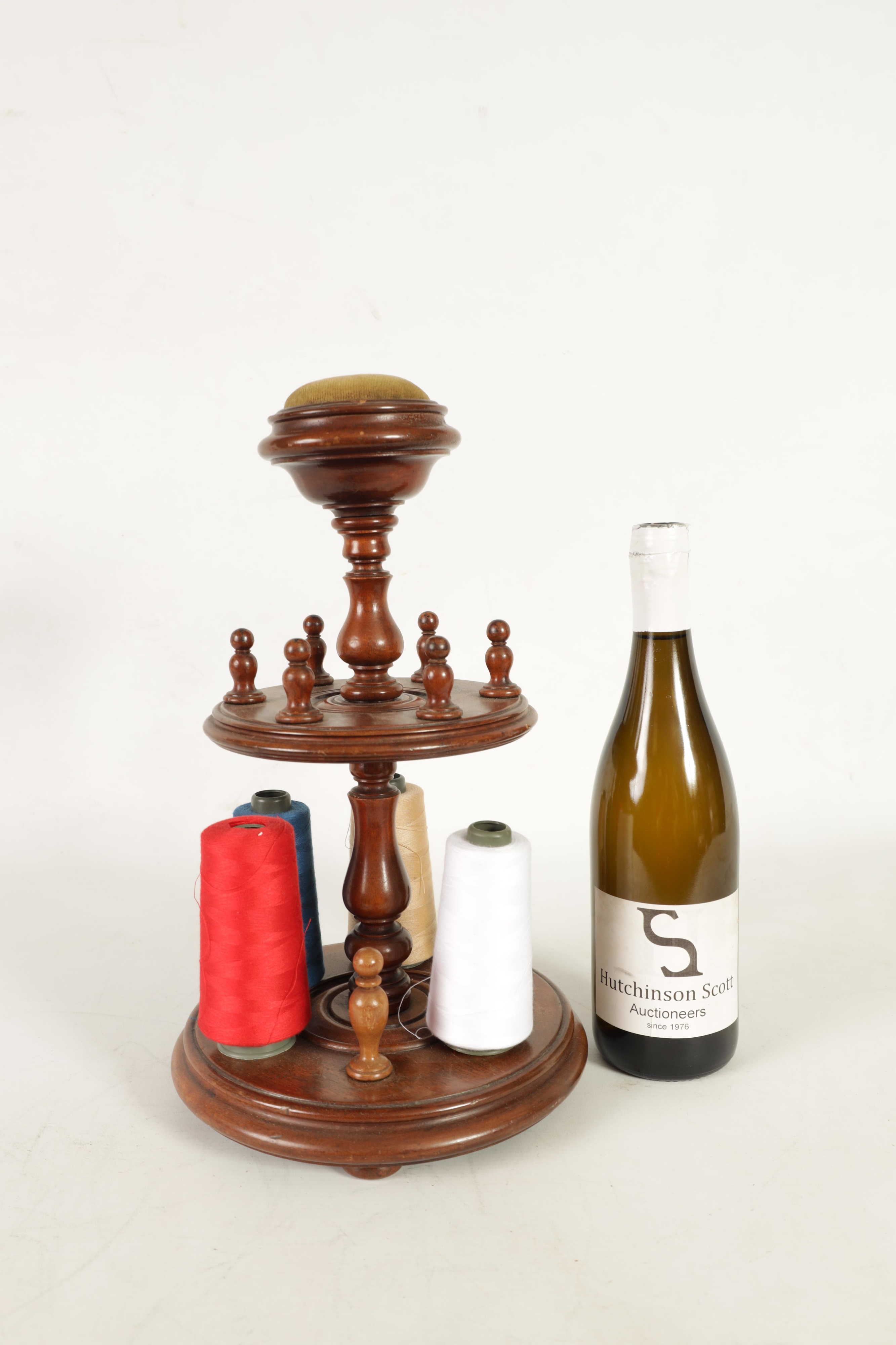 Lot 858 - A 19TH CENTURY TURNED MAHOGANY BOBBIN STAND