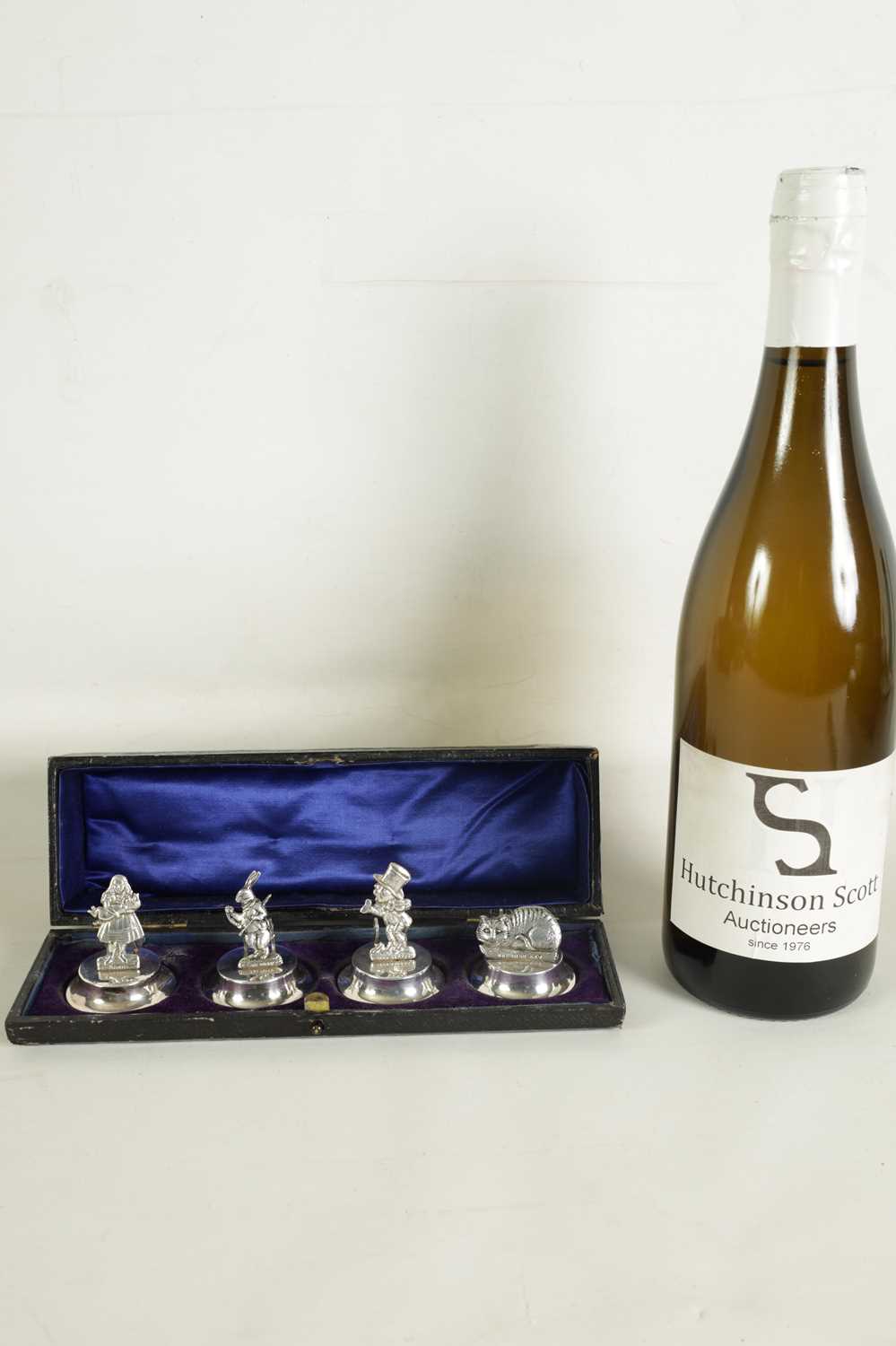 Lot 351 - A CASED SET OF FOUR SILVER 'ALICE IN