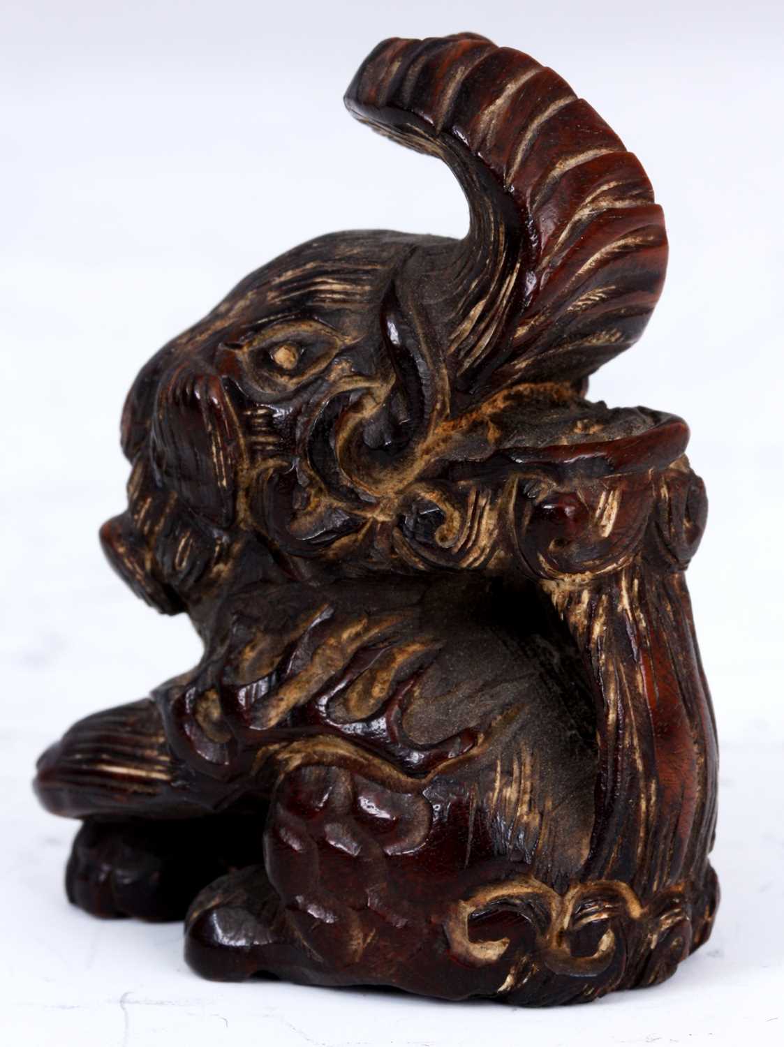 Lot 102 - A JAPANESE HARDWOOD NETSUKE of Baku,