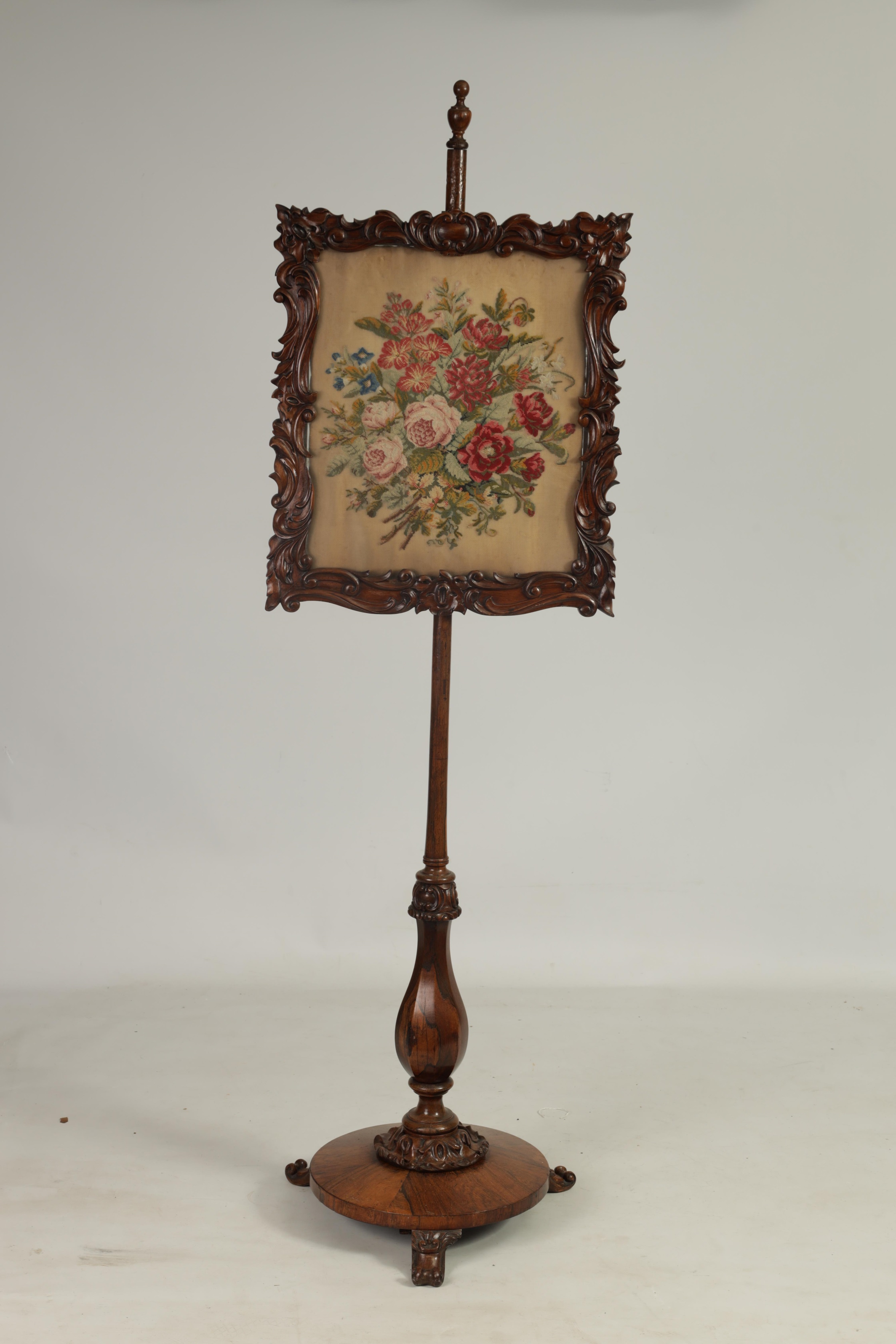Lot 1093 - A 19TH CENTURY ROSEWOOD POLE SCREEN