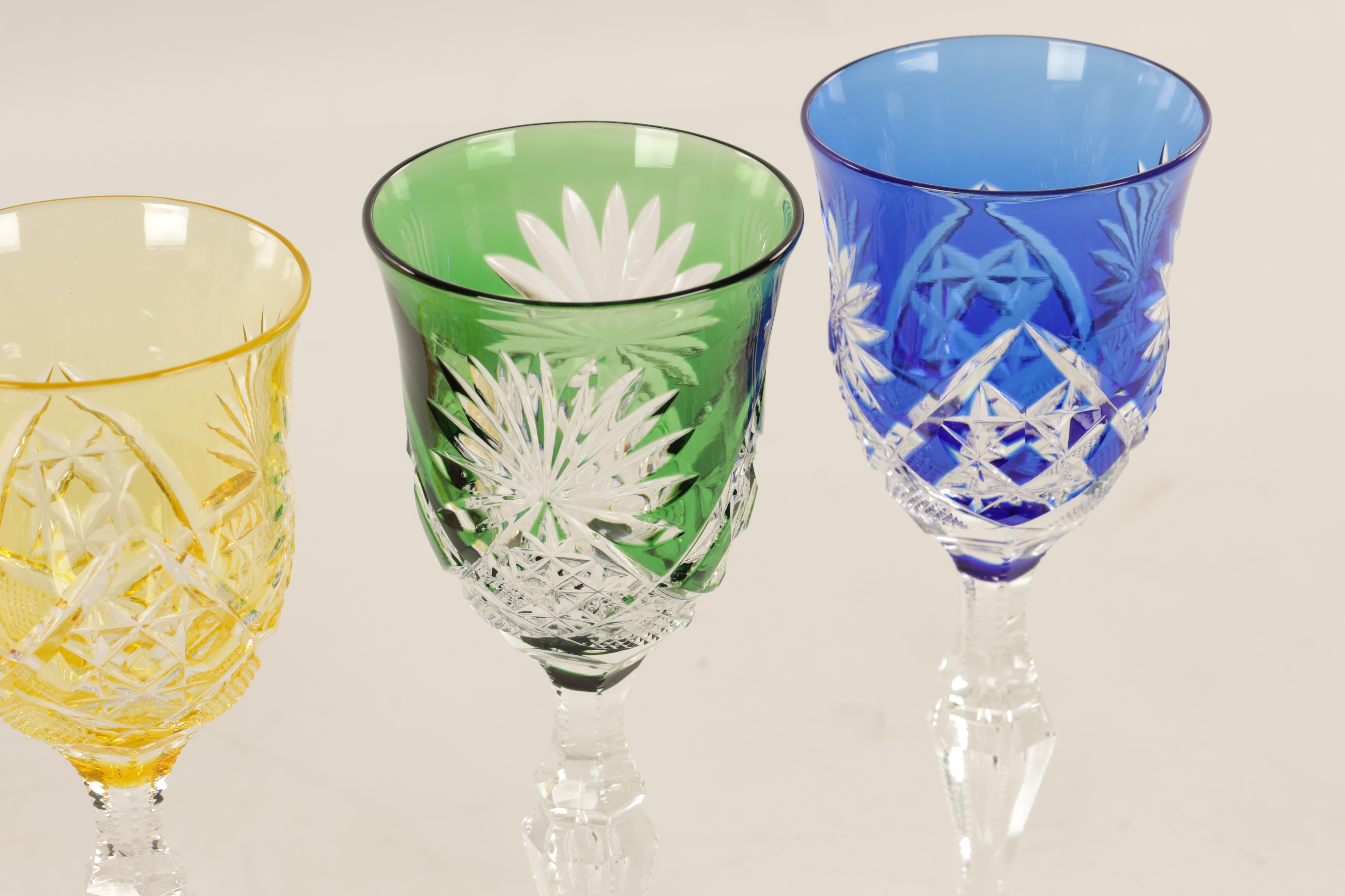 Lot 2 - A SET OF EIGHT 20TH CENTURY COLOURED CUT GLASS