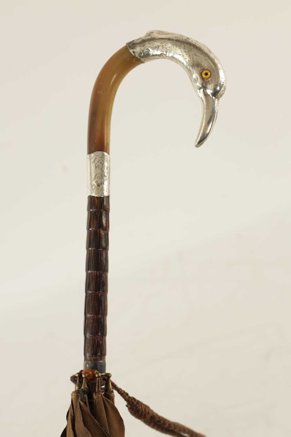 Lot 563 - A 19TH CENTURY HORN AND SILVER-TOPPED