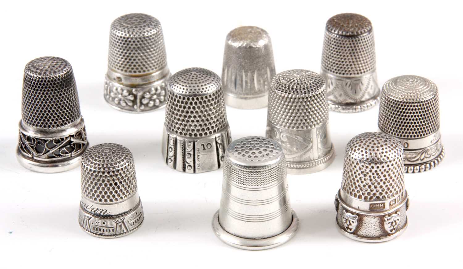 Lot 282 - A SELECTION OF 10 SILVER THIMBLES of various