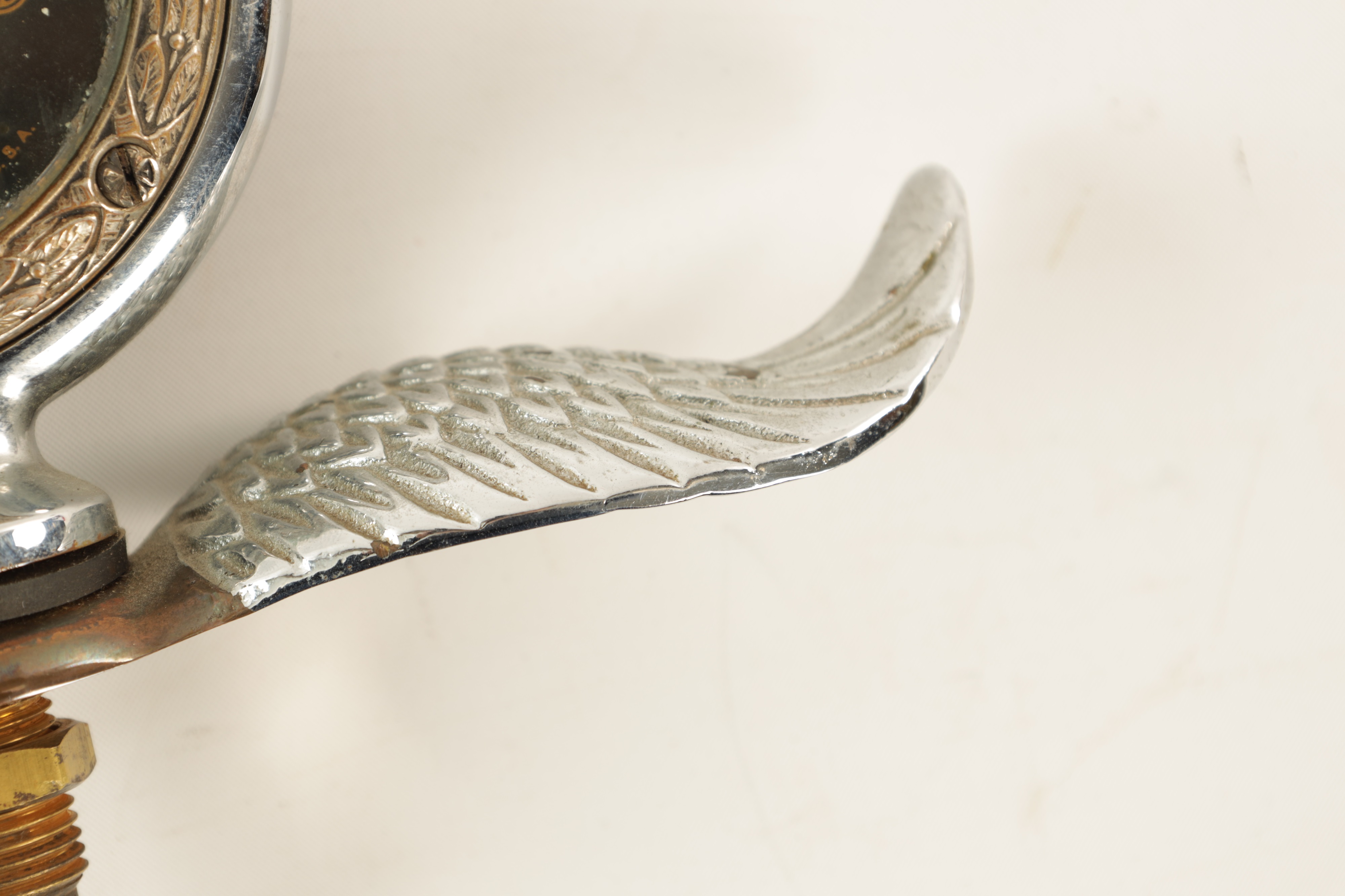 Lot 73 - A WINGED BOYCE MOTO METER RADIATOR CAP/CAR