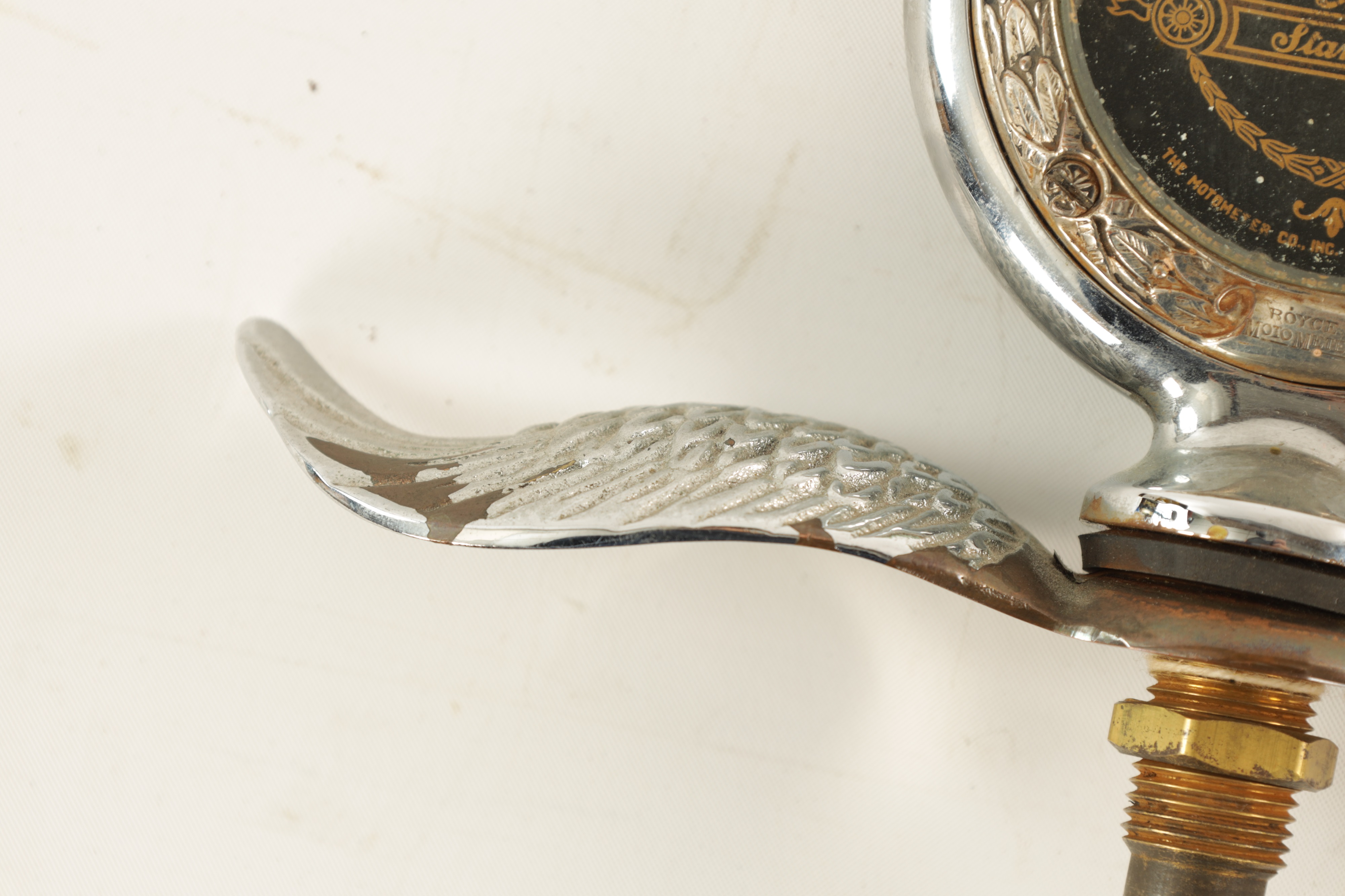 Lot 73 - A WINGED BOYCE MOTO METER RADIATOR CAP/CAR
