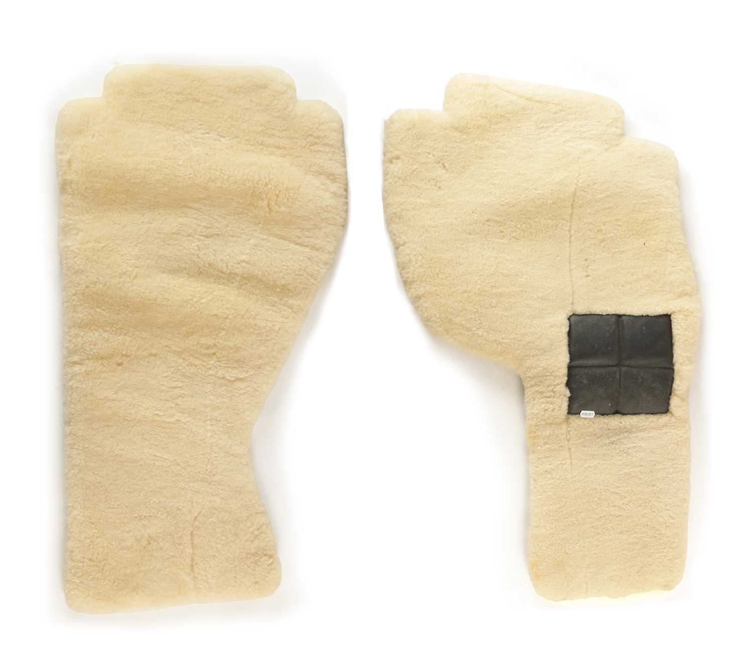 Lot 33 - TWO SHEEPSKIN FOOTWELL MATS POSSIBLY FOR A
