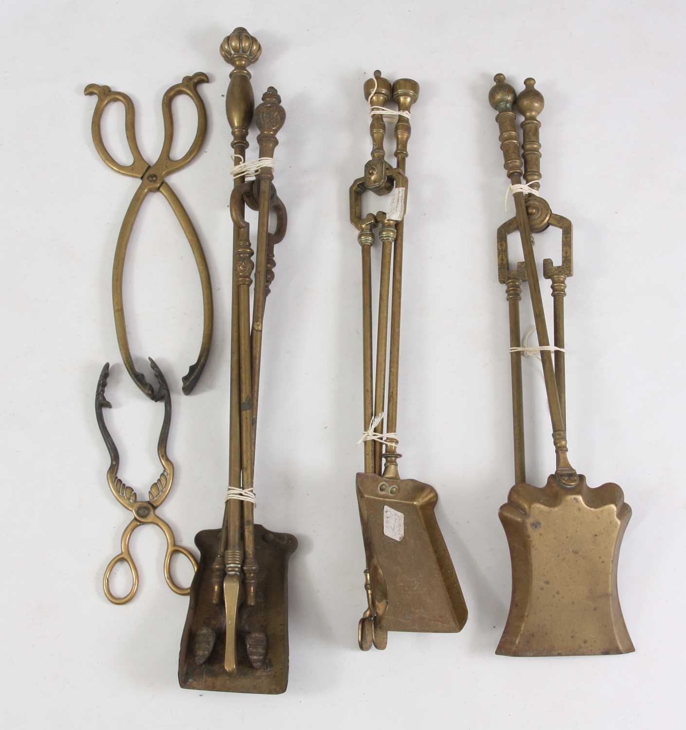 Lot 542 - A SELECTION OF 19th CENTURY BRASS FIRE IRONS