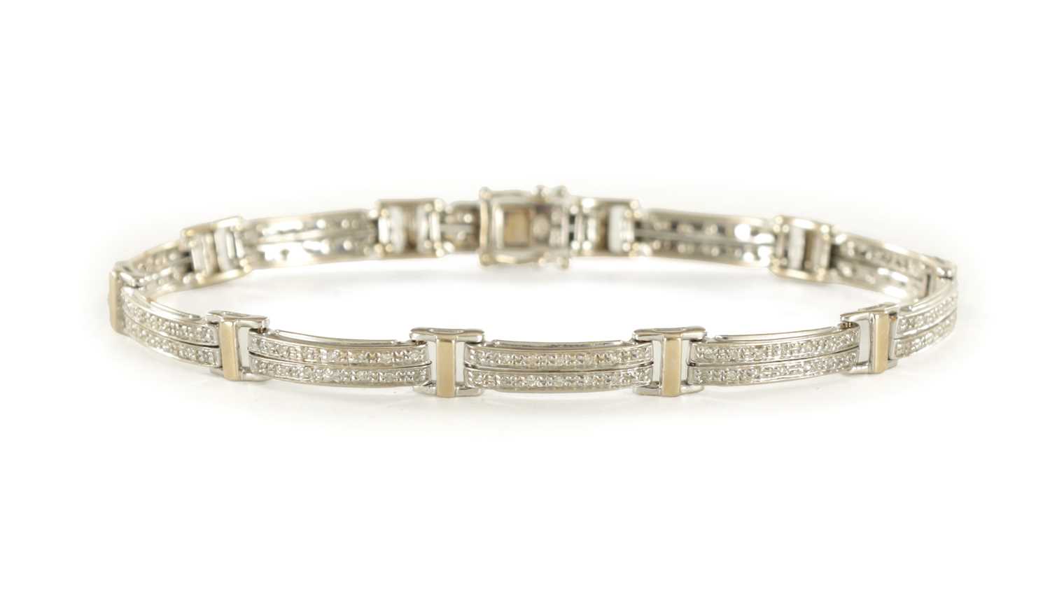 Lot 363 - AN 18CT GOLD DIAMOND SET BRACELET