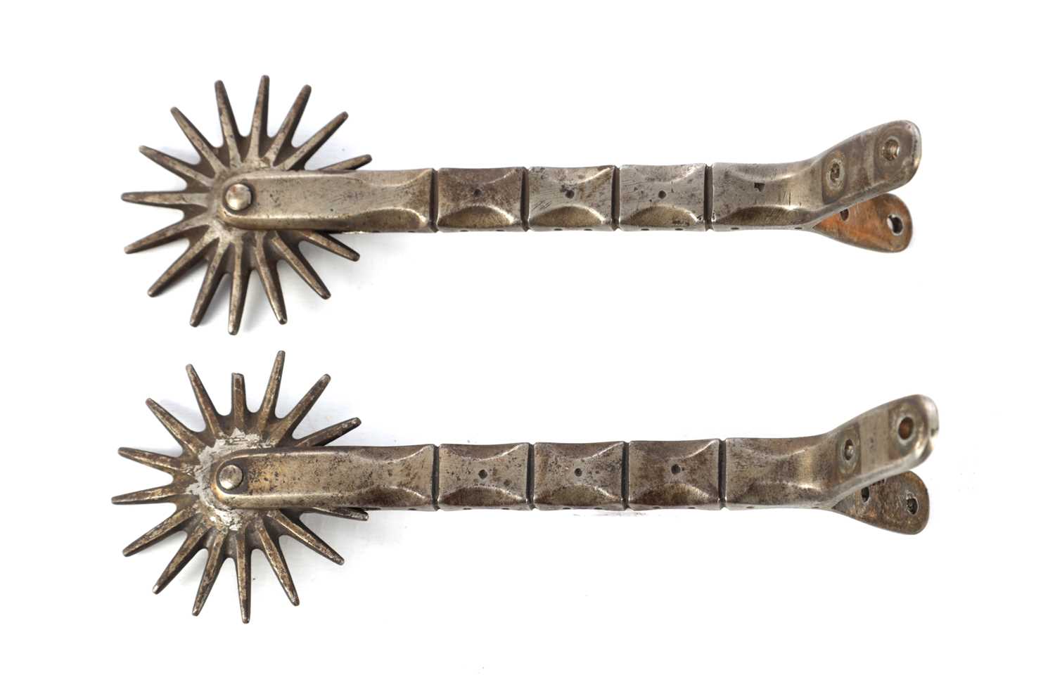 Lot 677 - A PAIR OF 17TH CENTURY IRON SPURS