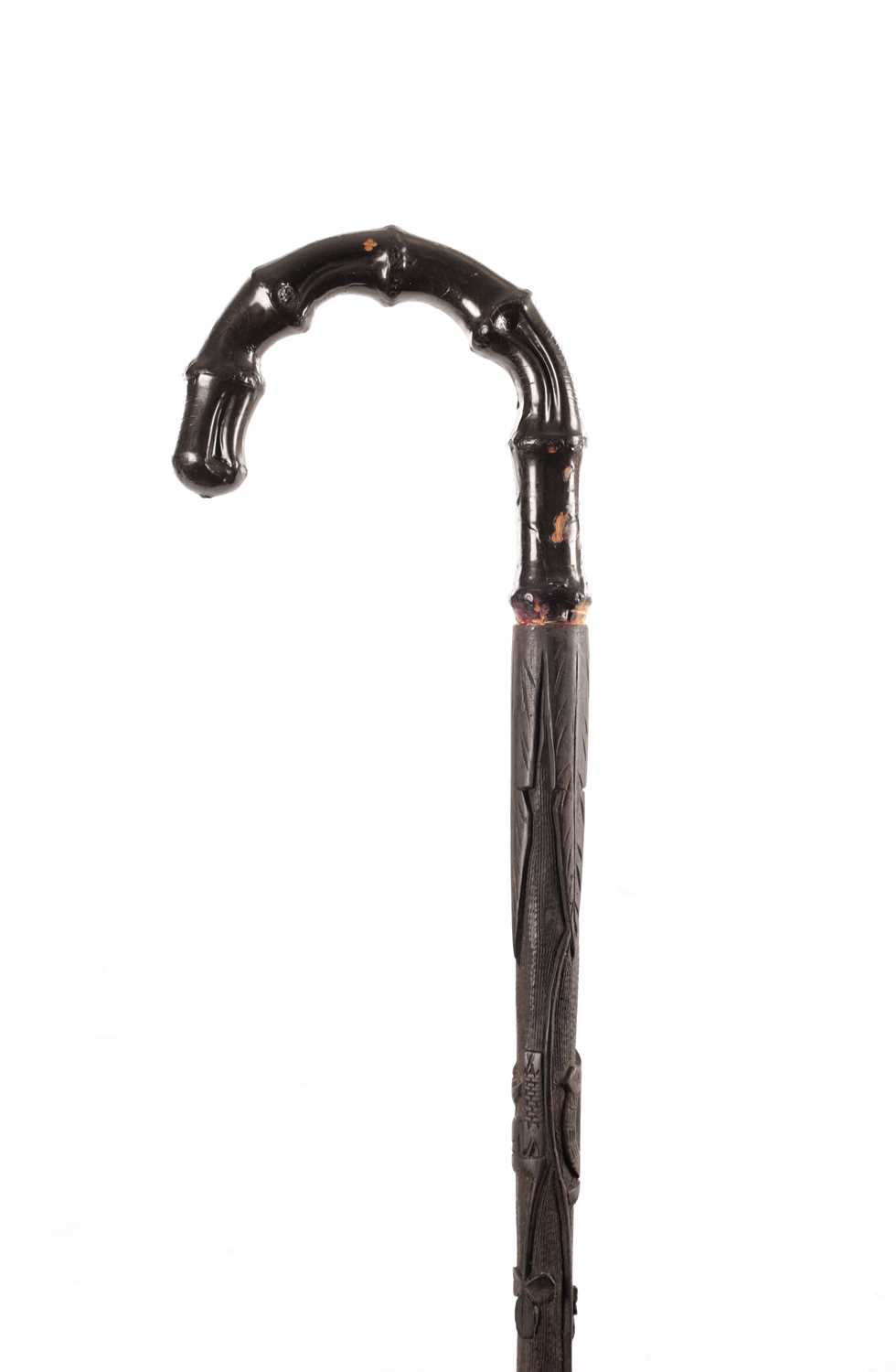 Lot 617 - A 19TH CENTURY IRISH BOG OAK WALKING STICK