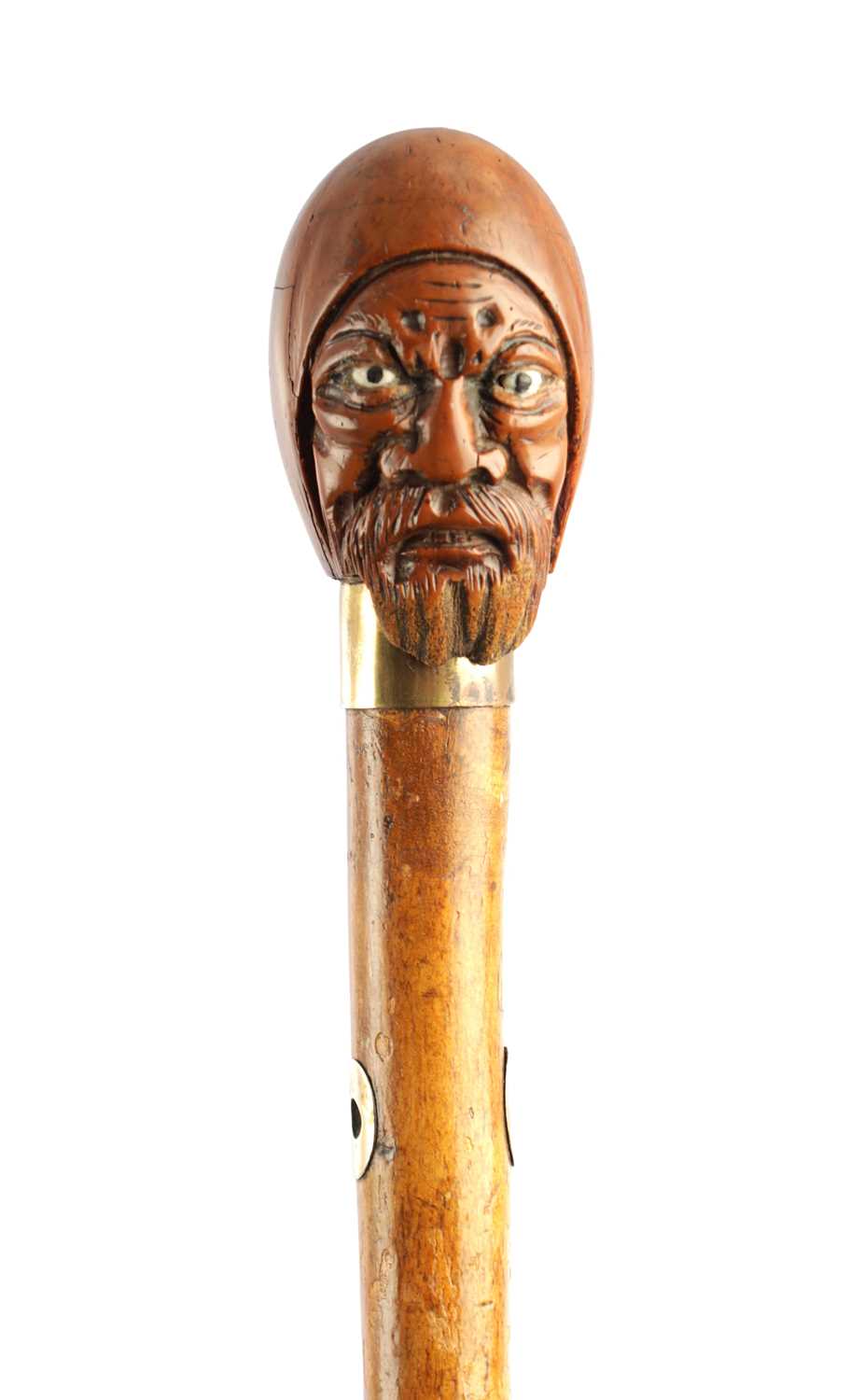 Lot 639 - A 19TH CENTURY CARVED COQUILLA NUT HANDLE
