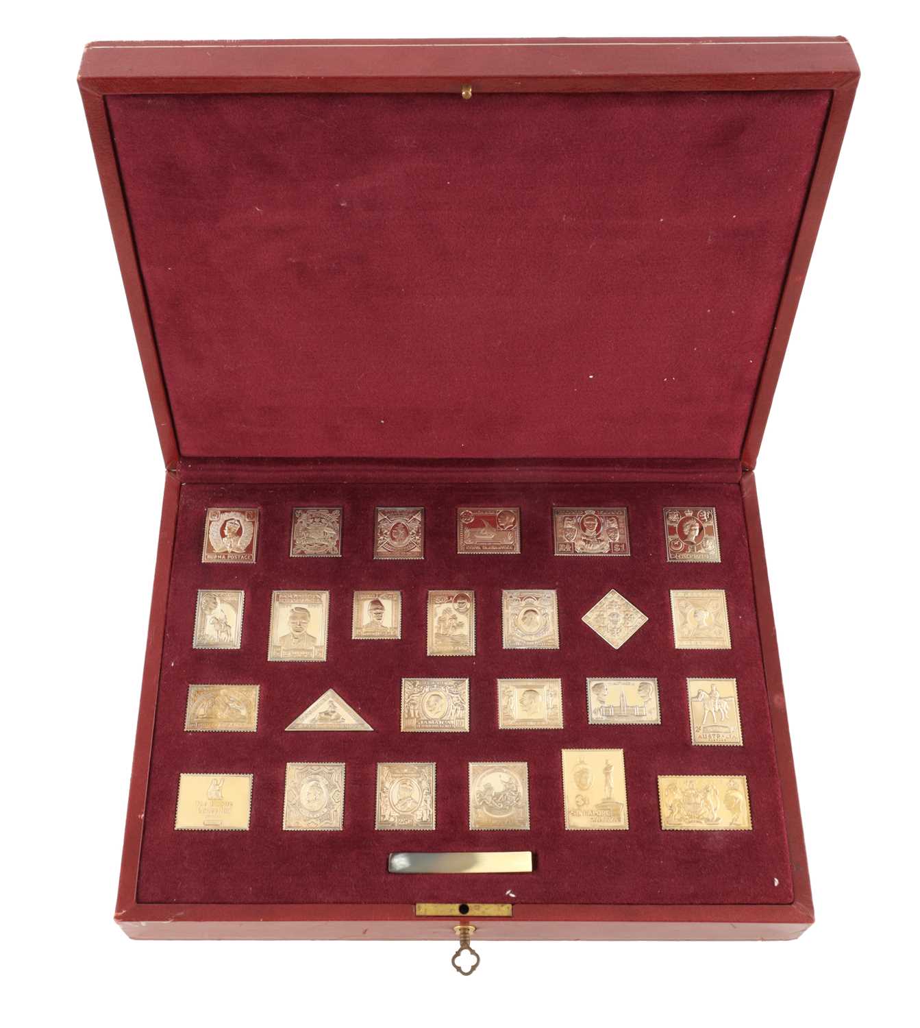 Lot 314 - A CASED SET OF SILVER GILT STAMPS IN A