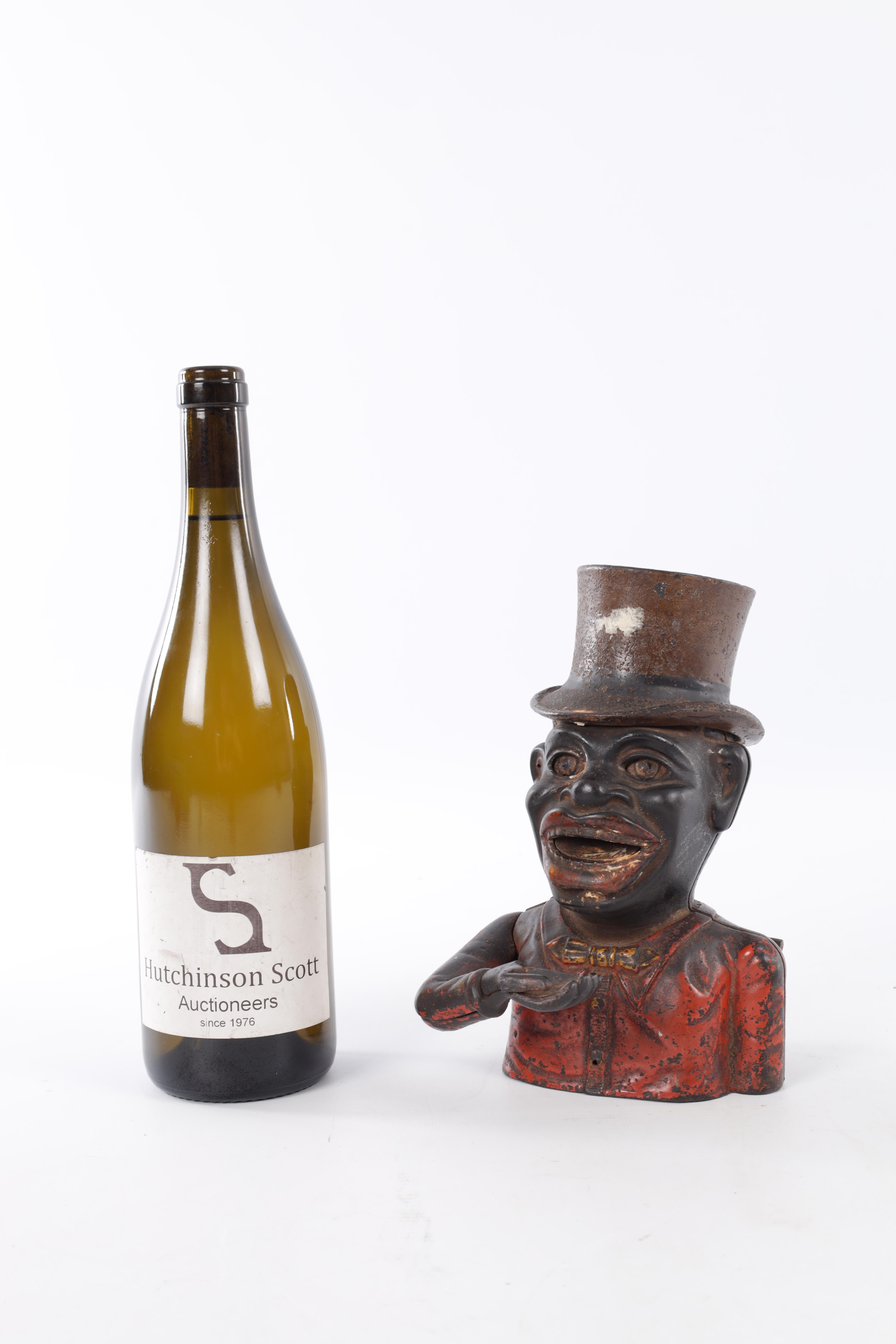 Lot 326 - A LATE 19TH CENTURY PAINTED CAST IRON 'JOLLY'