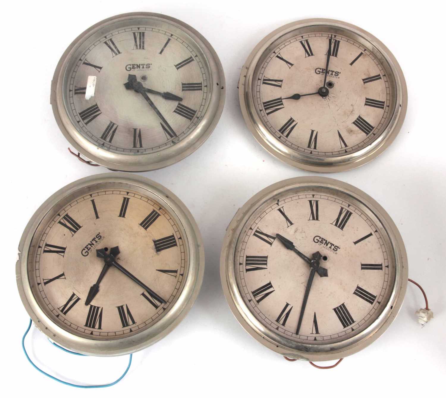 Lot 242 - FOUR GENTS ELECTRIC SLAVE CLOCKS with nickel