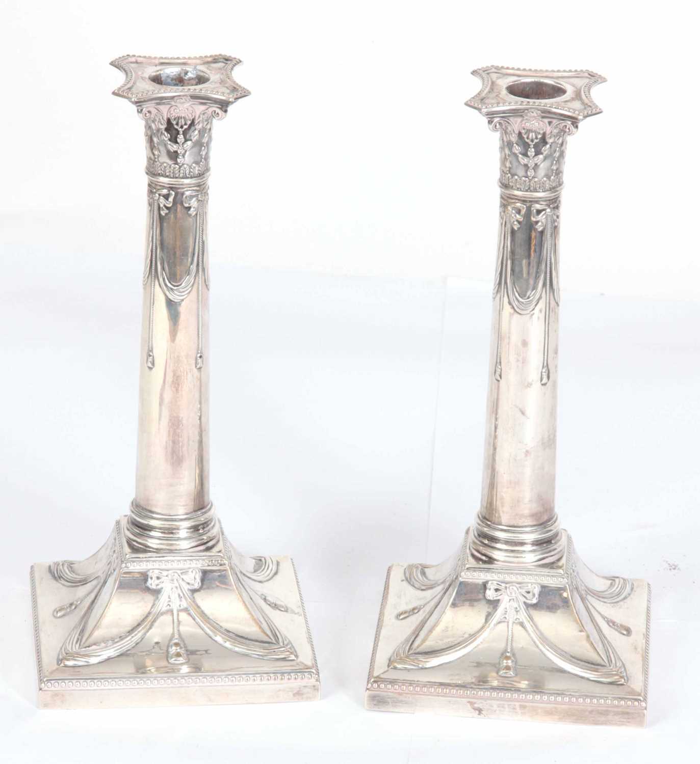 Lot 588 - A PAIR OF SILVER ADAMS STYLE CORINTHIAN