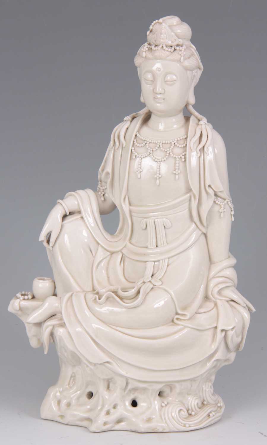 Lot 135 - A CHINESE BLANC DE CHINE PORCELAIN FIGURE OF