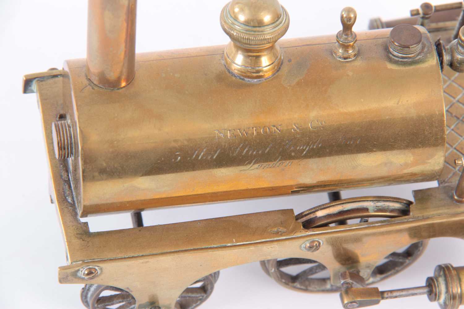 Lot 709 - A BRASS MODEL OF A STEAM ENGINE having been