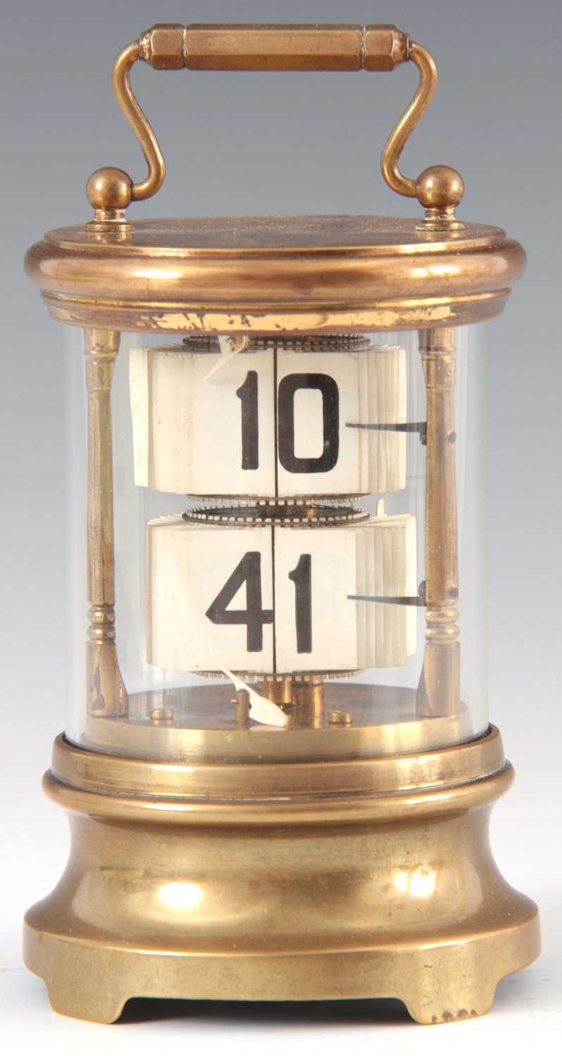 Lot 770 - AN EDWARDIAN BRASS FLIP DIAL CARRIAGE CLOCK