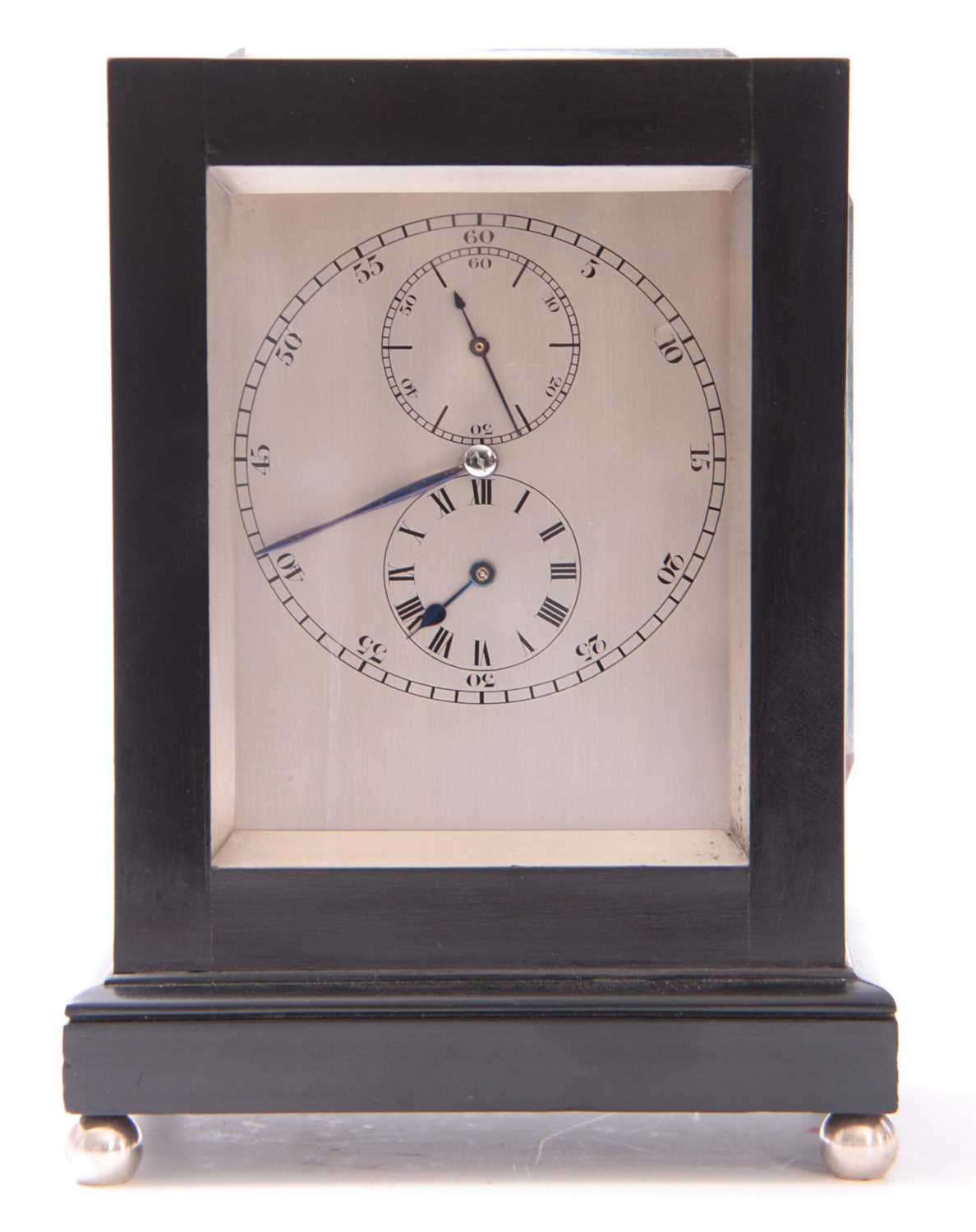 Lot 522 - A SMALL EBONY VENEERED TABLE REGULATOR the